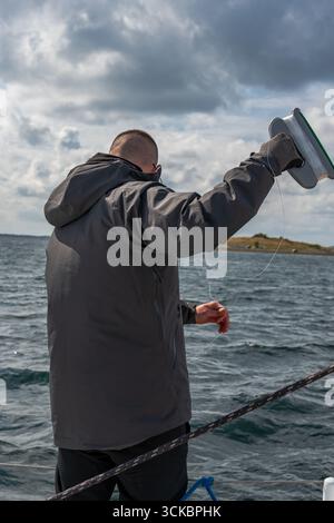 A calm sea under the cloudy sky Stock Photo - Alamy