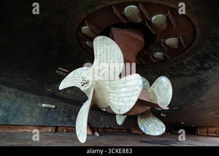 The bottom of a ship supported in dry dock with azimuth propulsion and ...