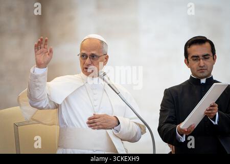 Pope Leo XIV delivers his blessing as he visits Pavia's Cathedral ...