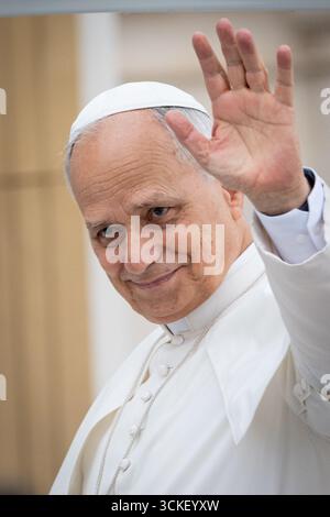 Pope Leo XIV greets a faithful during his weekly general audience in St ...