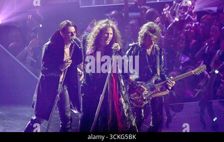 Yungblud, Steven Tyler, and Joe Perry perform Ozzy Osbourne tribute onstage during the 2025 MTV ...