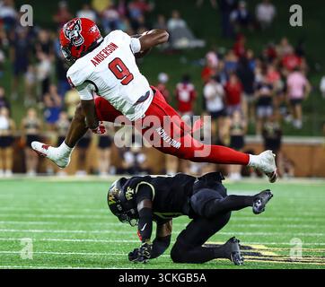 September 11,2025: NC State quarterback CJ Bailey (11) goes into fourth ...