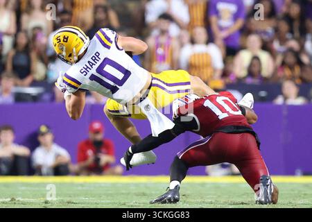 LSU tight end Bauer Sharp (10) tries to hurdle over Southeastern ...
