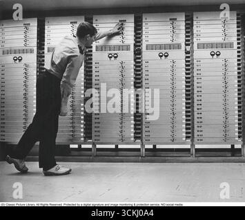 1970s MAN AT CONTROL ROOM CONSOLE OF TV STUDIO Stock Photo - Alamy