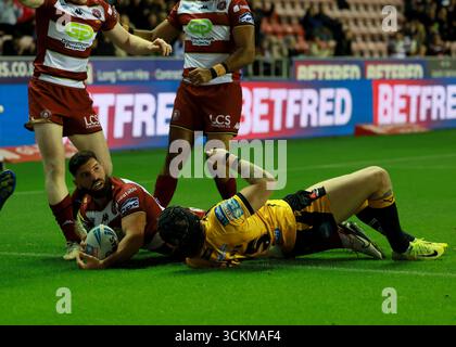 Wigan Warriors Abbas Miski scores the opening try during the Betfred ...