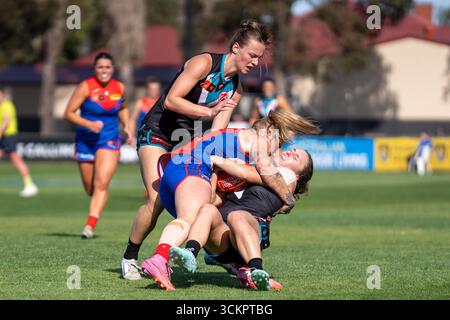 Shineah Goody (16 Port Adelaide) tackles Georgie Prespakis (41 Geelong ...