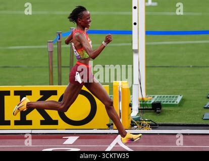 Beatrice CHEBET of Kenya crosses the finish line to win in the Women's ...
