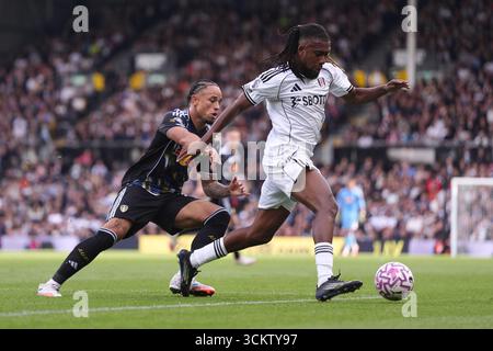 Leeds United's Noah Okafor and Fulham's Timothy Castagne (right) battle ...