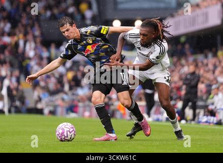 Leeds United's Brenden Aaronson and Fulham's Antonee Robinson battle ...
