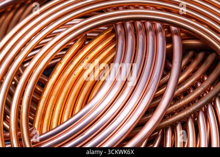 New copper twisted pipes of the same diameter Stock Photo - Alamy