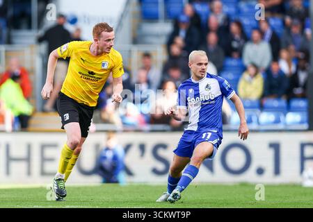 Barrow's Lewis Shipley in action with Crewe's Conor Thomas during the ...