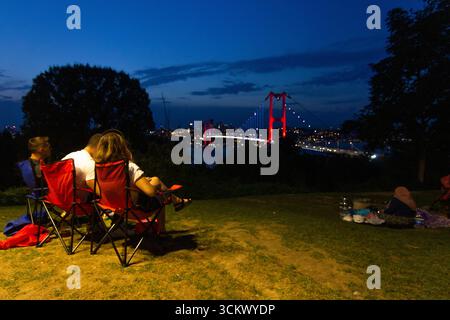 15 July Martyrs Bridge, white boat, Turkish Flag, and Bosphorus Stock ...