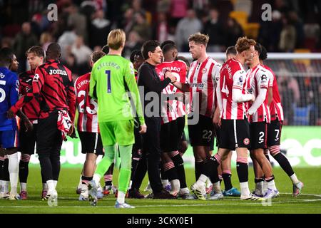 Nathan Collins of Brentford and manager Keith Andrews after the West ...