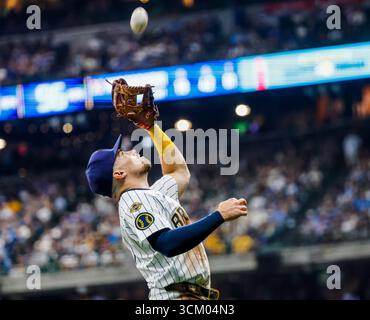 Milwaukee Brewers' Caleb Durbin is hit by a pitch during the sixth ...