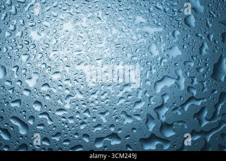 Water on a rough surface with an optical illusion of concave-convex ...