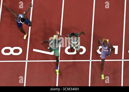 United States' Noah Lyles crosses the finish line in the men's 4 X 100 ...