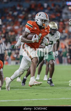 Miami running back Mark Fletcher Jr. (4) celebrates after scoring a ...