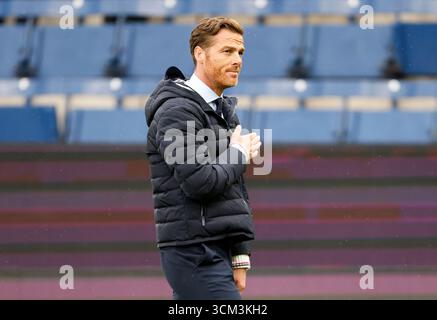 Burnley manager Scott Parker salutes the fans following the Premier ...