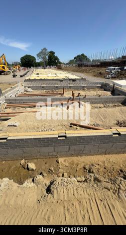 Ground level of new building construction site Stock Photo - Alamy