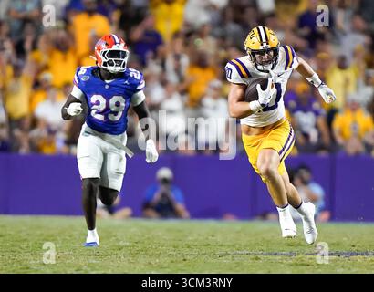 LSU tight end Bauer Sharp (10) tries to hurdle over Southeastern ...