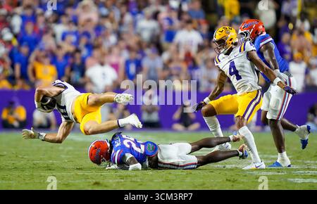 LSU tight end Bauer Sharp (10) tries to hurdle over Southeastern ...