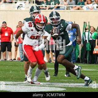 Michigan State quarterback Aidan Chiles (2) warms up before an NCAA ...