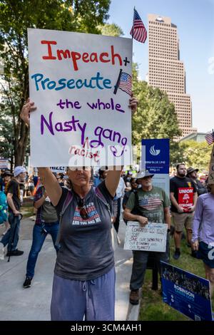 Atlanta, GA / USA - September 1, 2025: Closeup of woman's hand making a ...