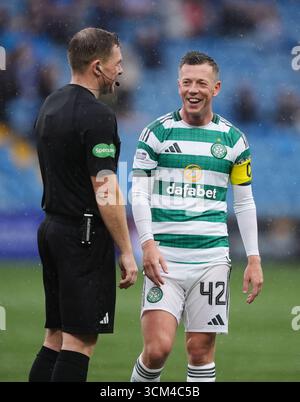Celtic's Callum McGregor appeals to referee Nick Walsh as he awards a ...