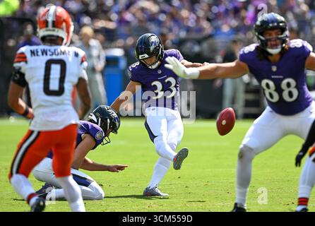 Baltimore Ravens kicker Tyler Loop (33) celebrates with punter Jordan ...