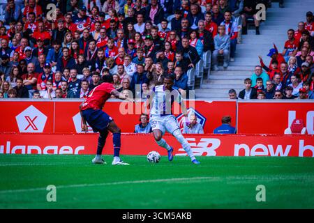 Yann Gboho of Toulouse Football Club and Julio Enciso of Strasbourg ...