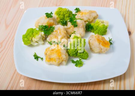 Fish balls of different white fish at plate with brokkoli, dish of ...