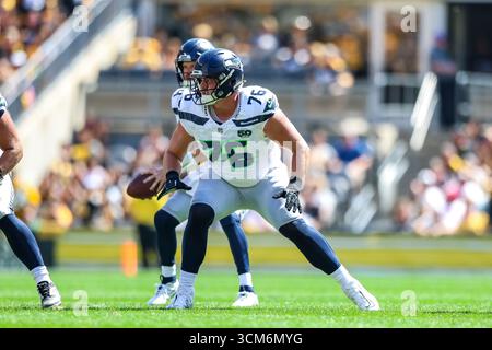 Seattle Seahawks guard Grey Zabel (76) gets help to exit the field ...
