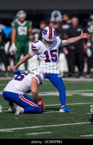 Buffalo Bills punter Cameron Johnston (16) punts during the second half of an NFL football game ...