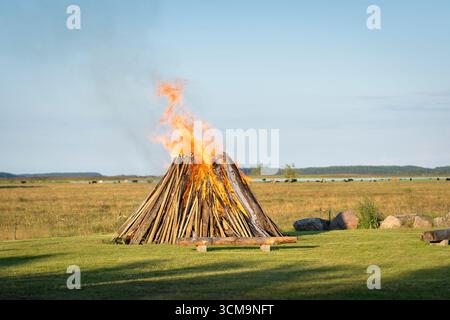 Bonfire on a beach at the midsummer festival in Jurmala, Latvia, Baltic ...