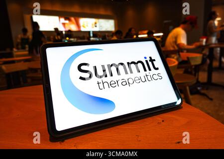 In this photo illustration, the Summit Therapeutics logo is displayed ...