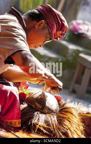 Temple craftsman prepares masks, temple dance, temple dancers, temple ...
