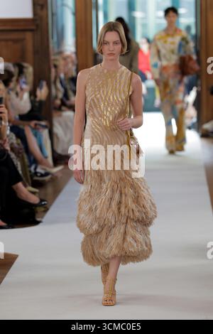 Model Maya Vozhdaeva is seen on the catwalk at the Jil Sander fashion ...