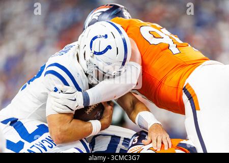 Denver Broncos defensive lineman Zach Allen looks on prior to an NFL football game against the ...