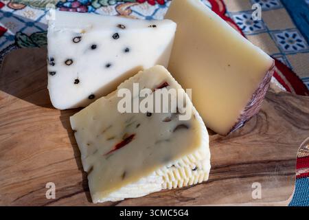Sicilian fresh organic black pecorino cheese Stock Photo - Alamy