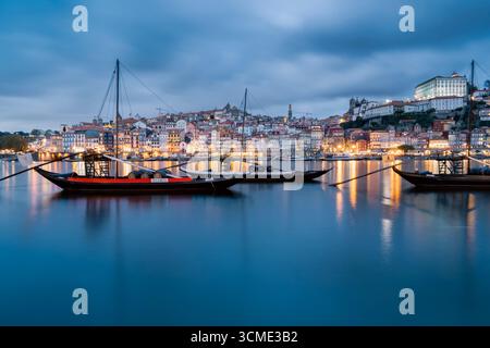 Moored boats at night in the Douro River, Porto Portugal Stock Photo ...