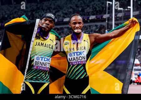 Tyler Mason and Orlando Bennett celebrating her medal with her country ...