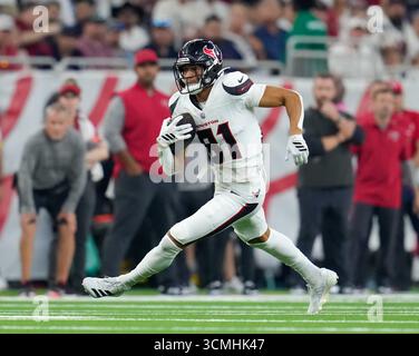 Houston Texans wide receiver Jayden Higgins (81) scores a touchdown ...