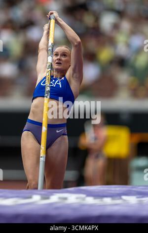Katie Moon (USA) runs down the runway of the pole vault qualifying ...