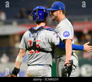 Chicago Cubs catcher Carson Kelly catches a popout hit by Seattle ...
