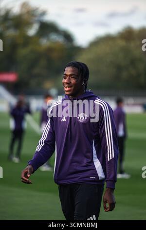 Godwill Kukonki (14 Manchester United U21s) warming up during the ...