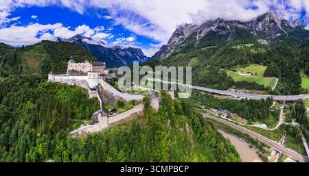 A drone aerial view of Hohenwerfen Castle or Festung with an autumn ...