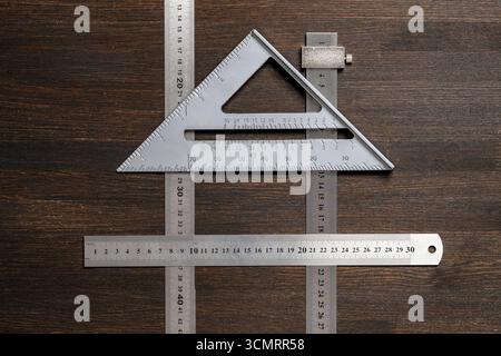 protractor and triangle tool in hand of math man teacher, education at ...