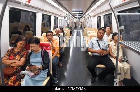 CHENGDU, CHINA - SEPTEMBER 17, 2025 - Citizens pass by the Jichechang ...