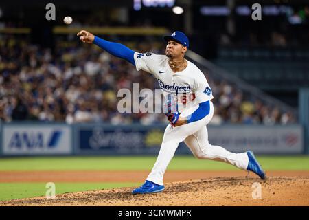 Los Angeles Dodgers pitcher Edgardo Henriquez walks off the field after ...