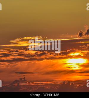 Dramatic fiery sky at sunset - contrast between warm and cold colors ...